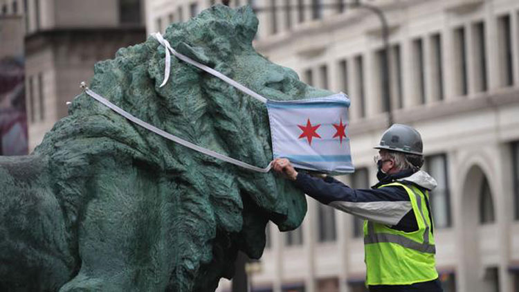 Chicago: even the city's statues wear masks